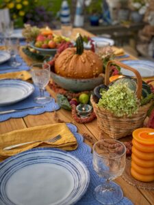 An Outdoor Harvest Table Set With Fall's Bounty - Molly in Maine
